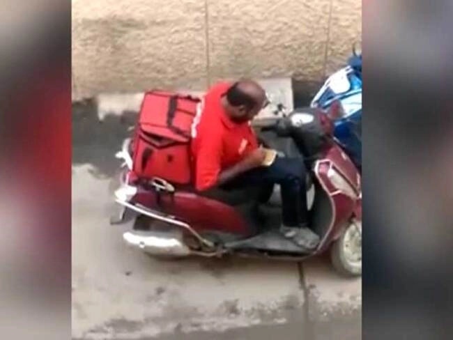 Zomato delivery boy takes a bite, video goes viral - The Economic Times