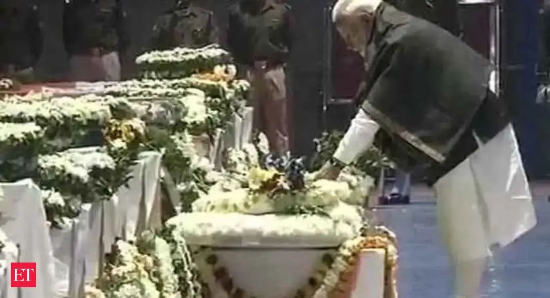 Pulwama attack: PM Narendra Modi lays wreath on mortal remains of CRPF ...