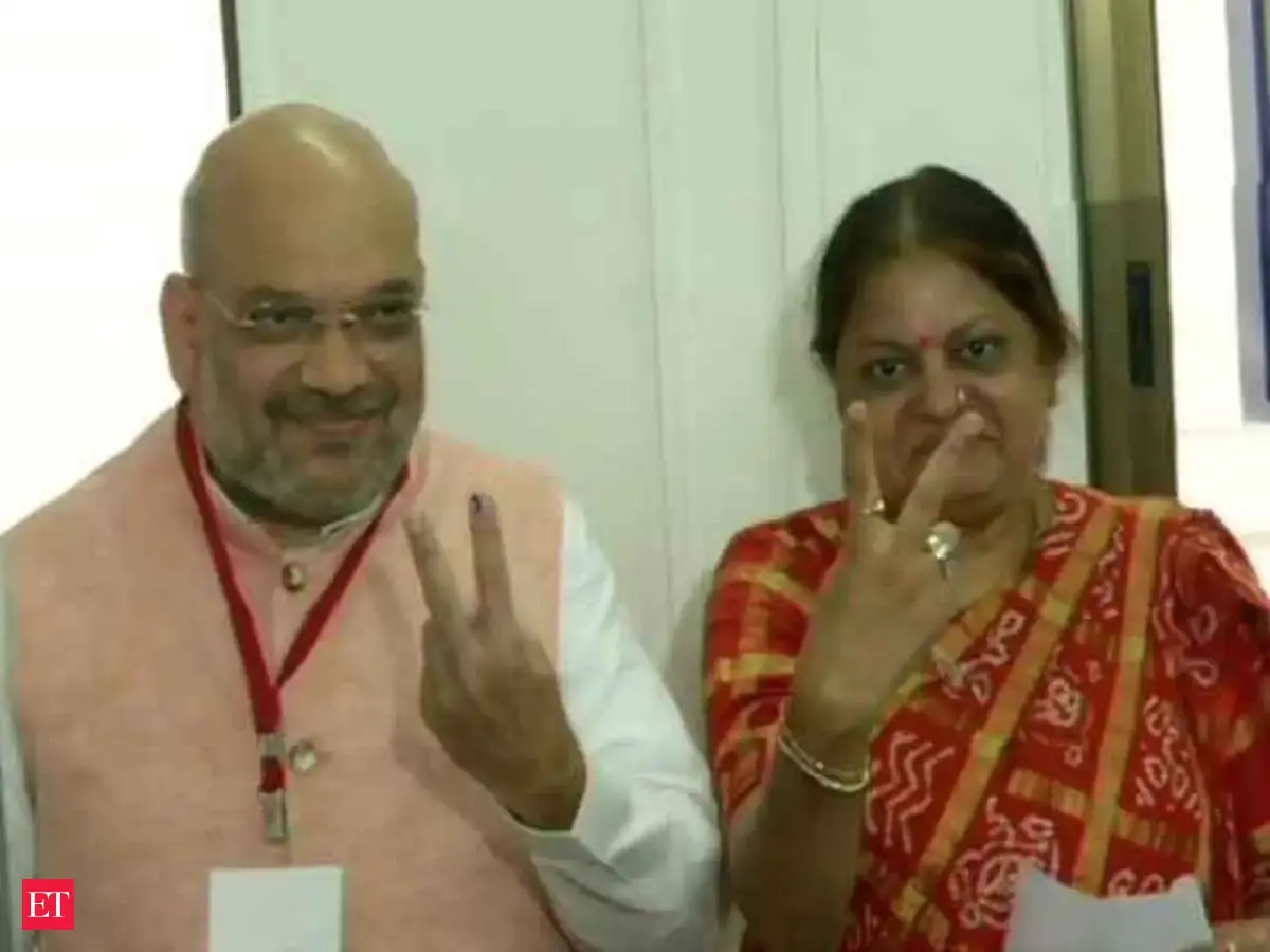 Amit Shah, wife Sonal Shah cast their votes at Naranpura polling booth ...