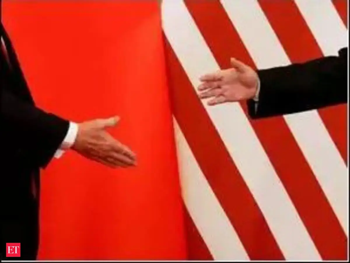 US signs first phase of trade deal with China - The Economic Times ...