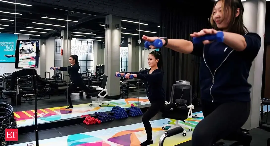 Amid outbreak, gyms in China livestream routines - Workout from home ...