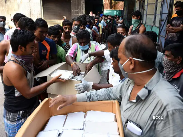 Distributing food packets - Coronavirus lockdown takes toll on migrant ...
