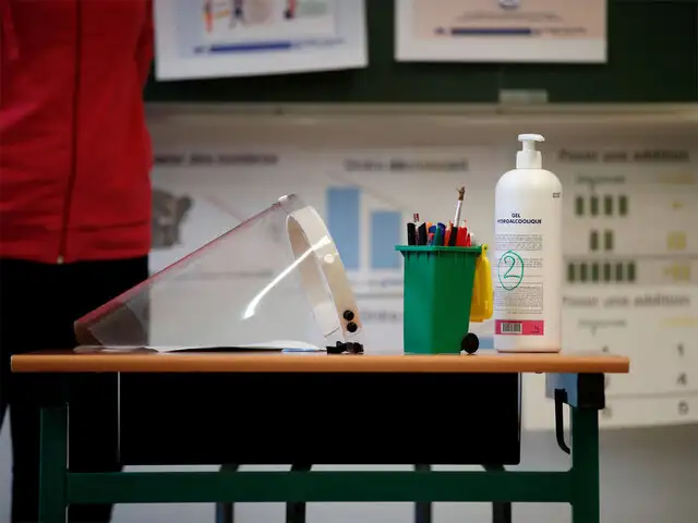 French children return to school, learn social distancing - Back to ...