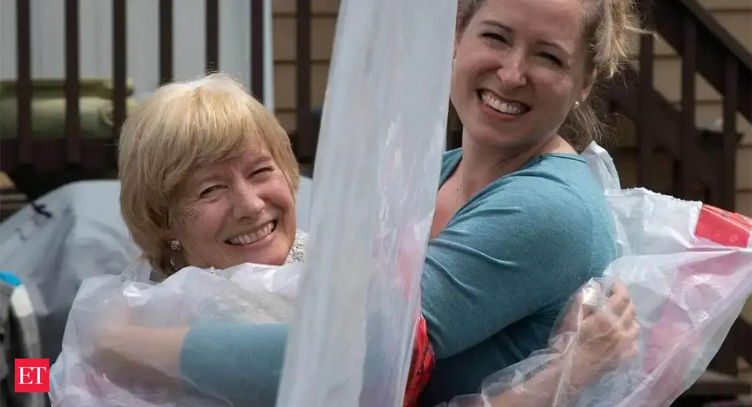 'Hug glove' gives Canada family bit of normalcy in pandemic - The hug ...