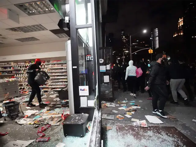 How a protest spiralled into looting in NYC - Protestors loot stores ...