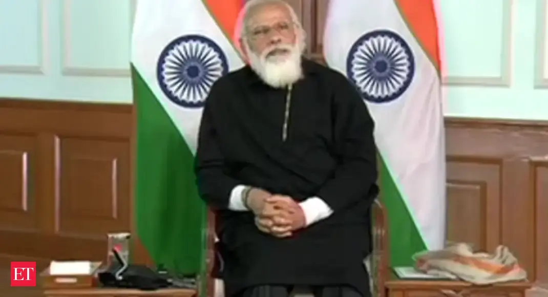 PM Modi dresses in 'pheran' gifted by J-K farm labourer to launch ...