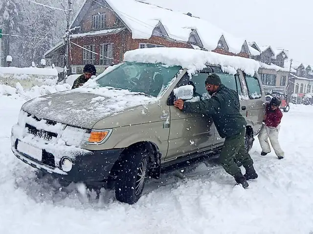 Disruption in daily life - Tourists flock to frozen waterfall in ...