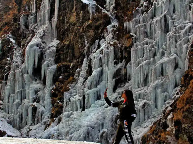 Tourists flock to frozen waterfall in Kashmir - Winter in Kashmir ...