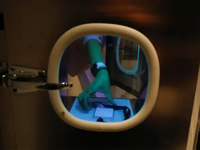 Documents under UV lights - Singapore's new "bubble" business hotel ...