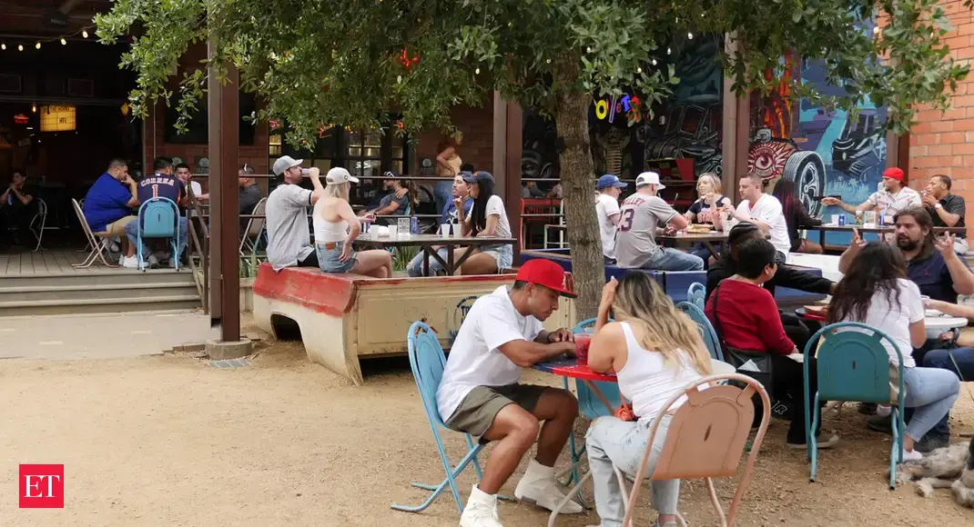 A bar offering a "post-pandemic world" without masks is a microcosm of ...