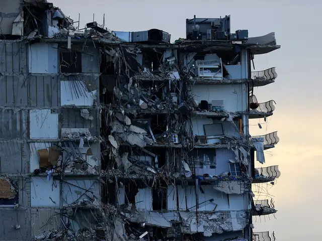 Explosives set off to bring down rest of collapsed condo - The ...