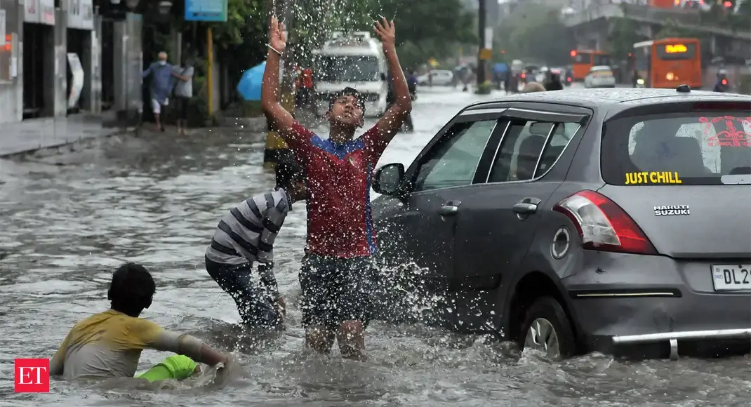 Knee-deep water - Delhi sees waterlogged streets with knee-deep water ...
