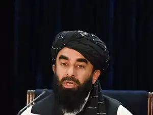 Mullah Hasan Akhund: Taliban name caretaker Cabinet that pays homage to ...