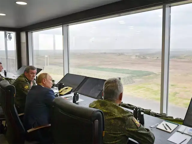 Vladimir Putin watches - Zapad: Indian troops conduct combat free fall ...