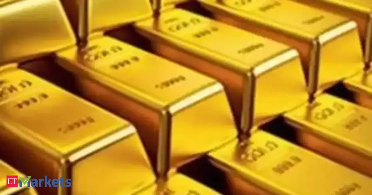 gold: Gold ticks higher as US bond yields, dollar ease - The Economic Times