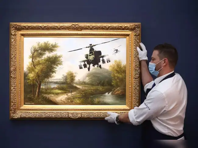 Banksy's 'Vandalised Oil' artwork from singer Robbie Williams's ...