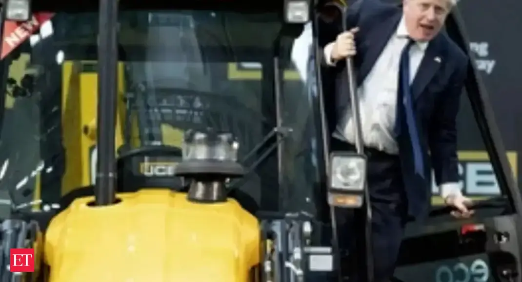 gujarat: Watch: Boris Johnson visits JCB Bulldozer factory at Halol ...