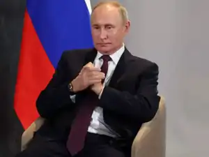 putin: With a grin, Russia President Vladimir Putin warns Ukraine: the ...