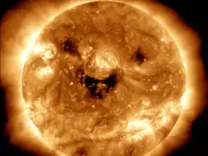sun: NASA captures Sun smiling! Photo inside - The Economic Times