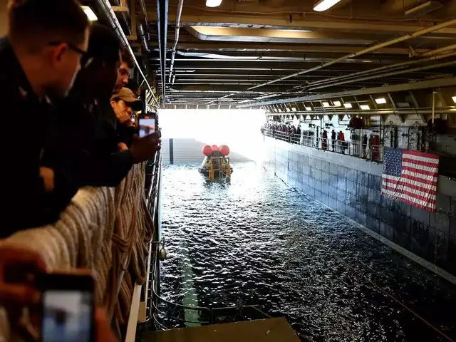 NASA capsule Orion splashes down after record-breaking lunar voyage ...