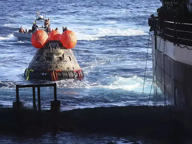 NASA capsule Orion splashes down after record-breaking lunar voyage ...