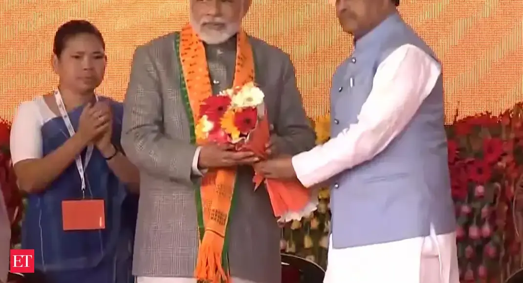 pm modi: Watch: Tripura CM Manik Saha felicitates PM Modi in Agartala ...