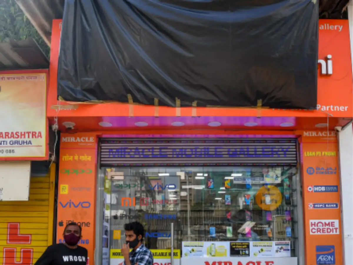 Xiaomi uses 'Made in India' banners to cover branding at stores - The ...