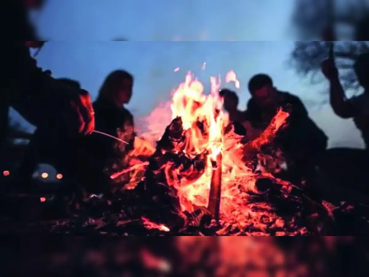 Sitting around a bonfire - The Economic Times