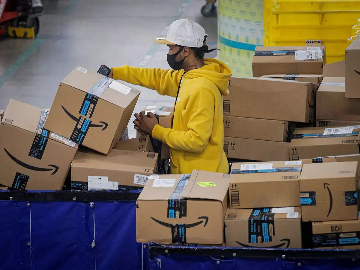amazon working conditions: Amazon settles with employees fired for ...